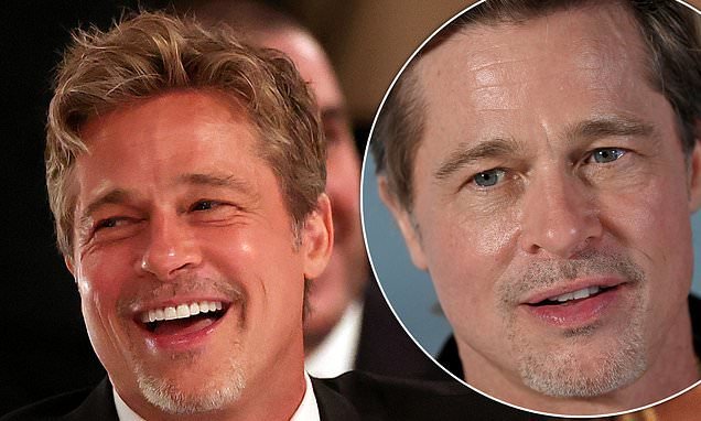 Brad Pitt shows off his bright white smile at the Golden Globes after ...